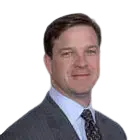 Dan Brennan | Traded Profile