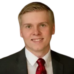 Michael Roukis | Traded Profile