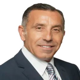 Tony Azzi | Traded Profile